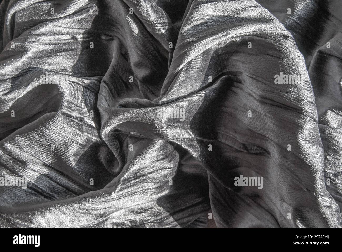 Reflective silver material with soft creases and folds Stock Photo - Alamy