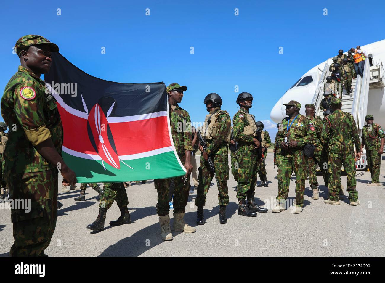Kenyan police, who are part of a UN-backed multinational force, pose ...