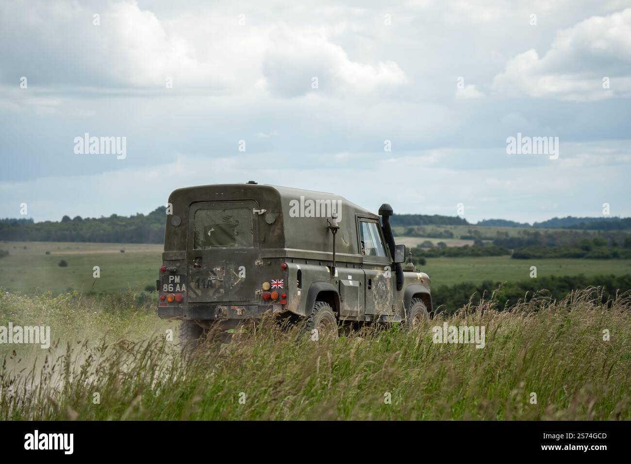 British army 4x4 utility vehicle in action Stock Photo - Alamy