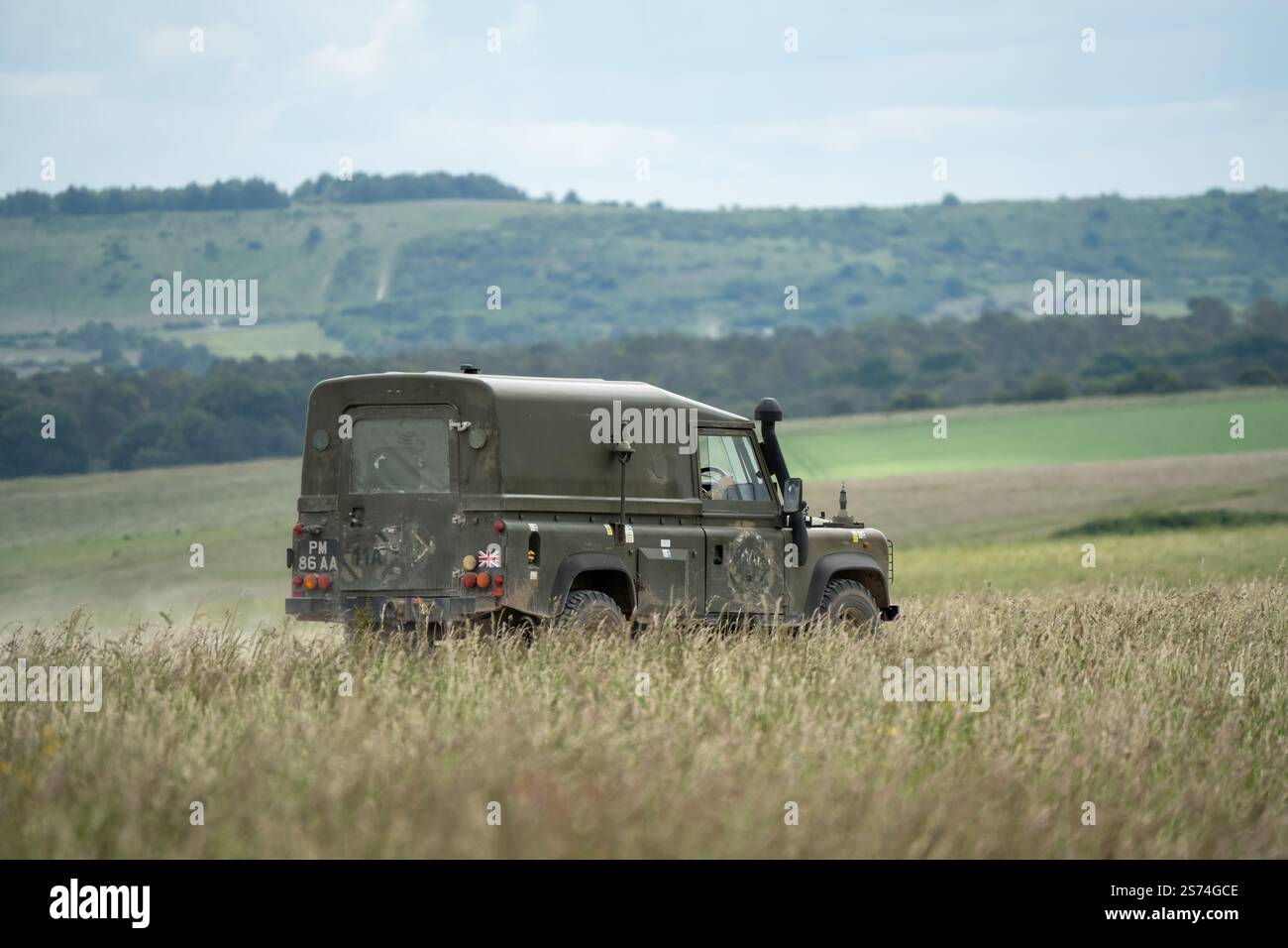 British army 4x4 utility vehicle in action Stock Photo - Alamy