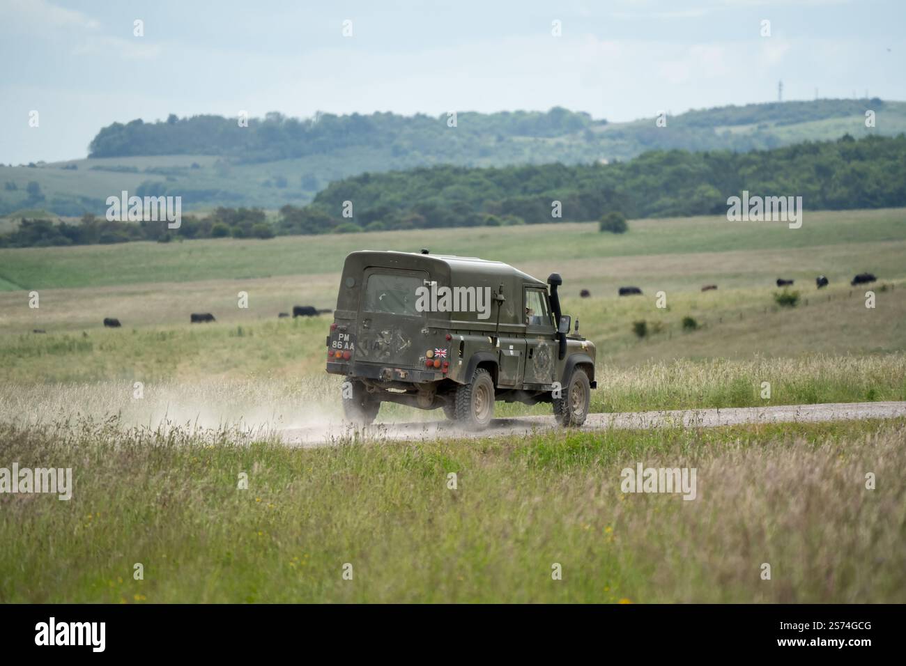 British army 4x4 utility vehicle in action Stock Photo - Alamy