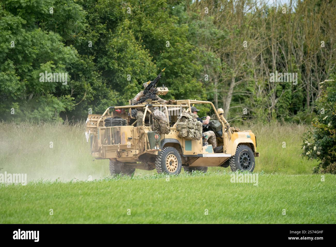British army 4x4 utility vehicle in action Stock Photo - Alamy