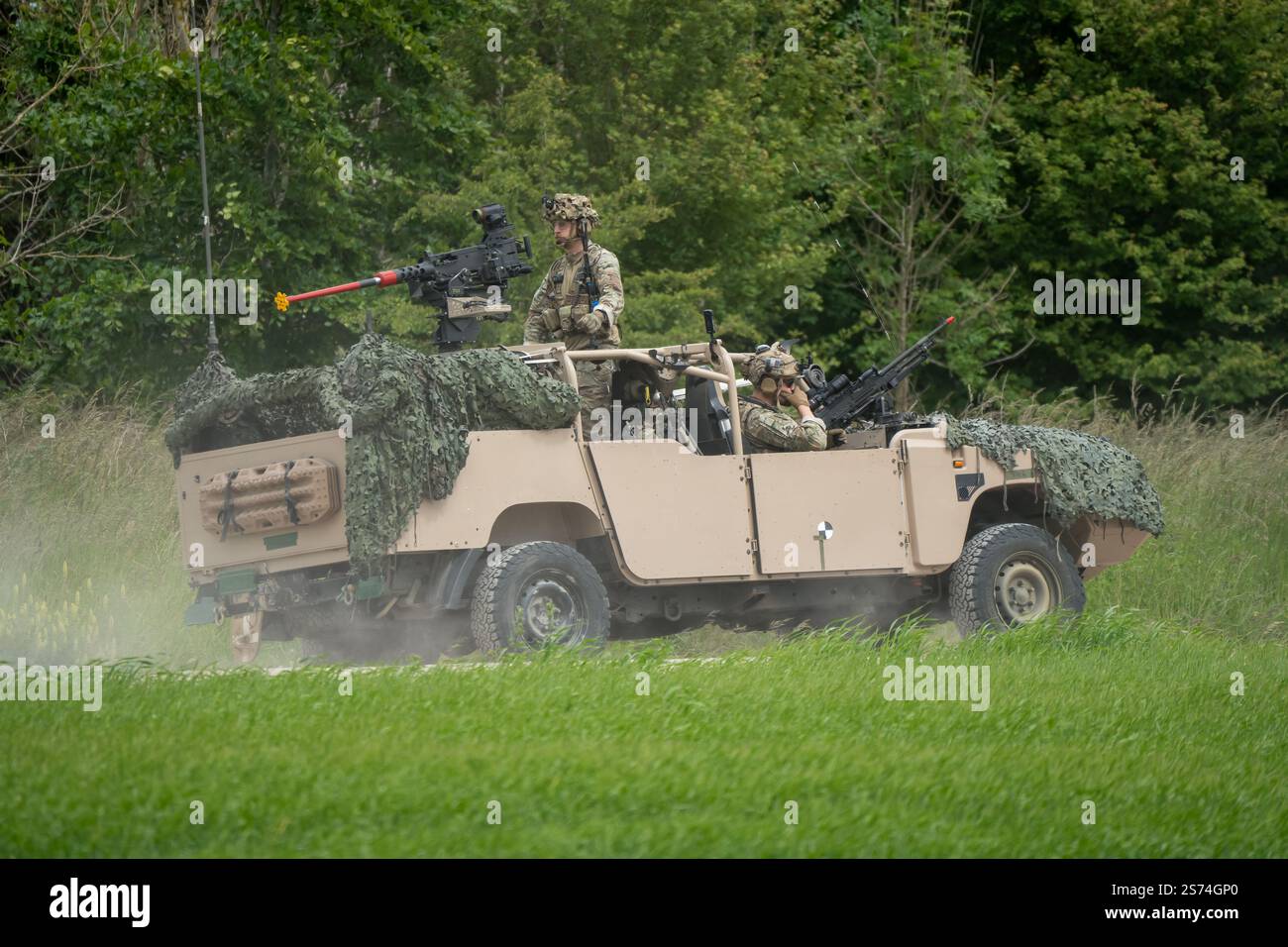 British army 4x4 utility vehicle in action Stock Photo - Alamy