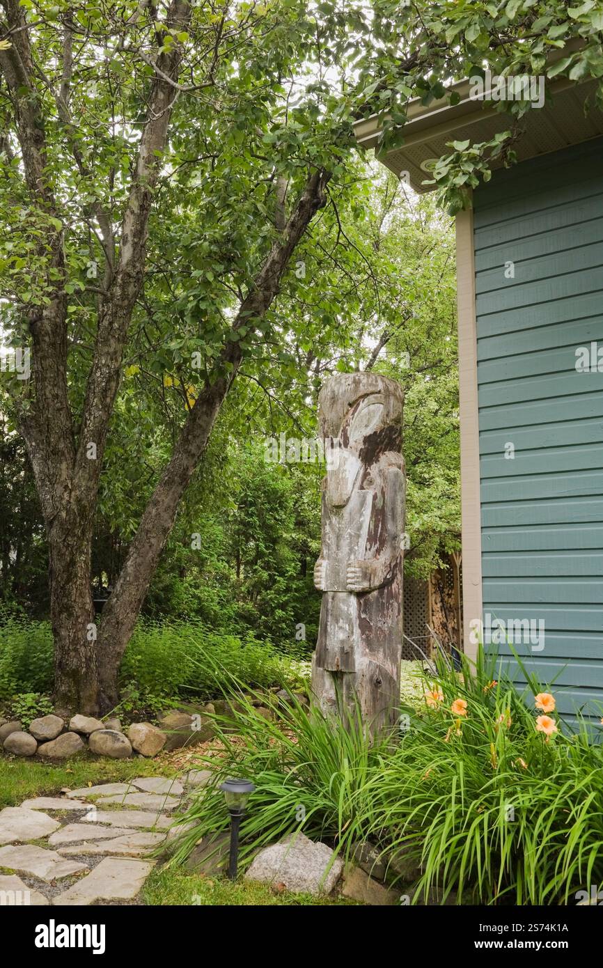 Jack rabbit Johanssen wooden totem pole in border with orange ...