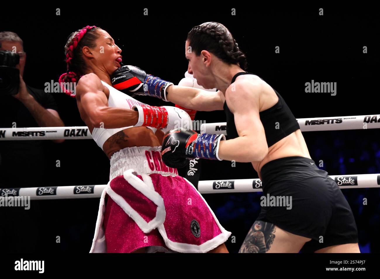 Carla Jade (left) in action against Melanie Shah in the Misfit Light ...