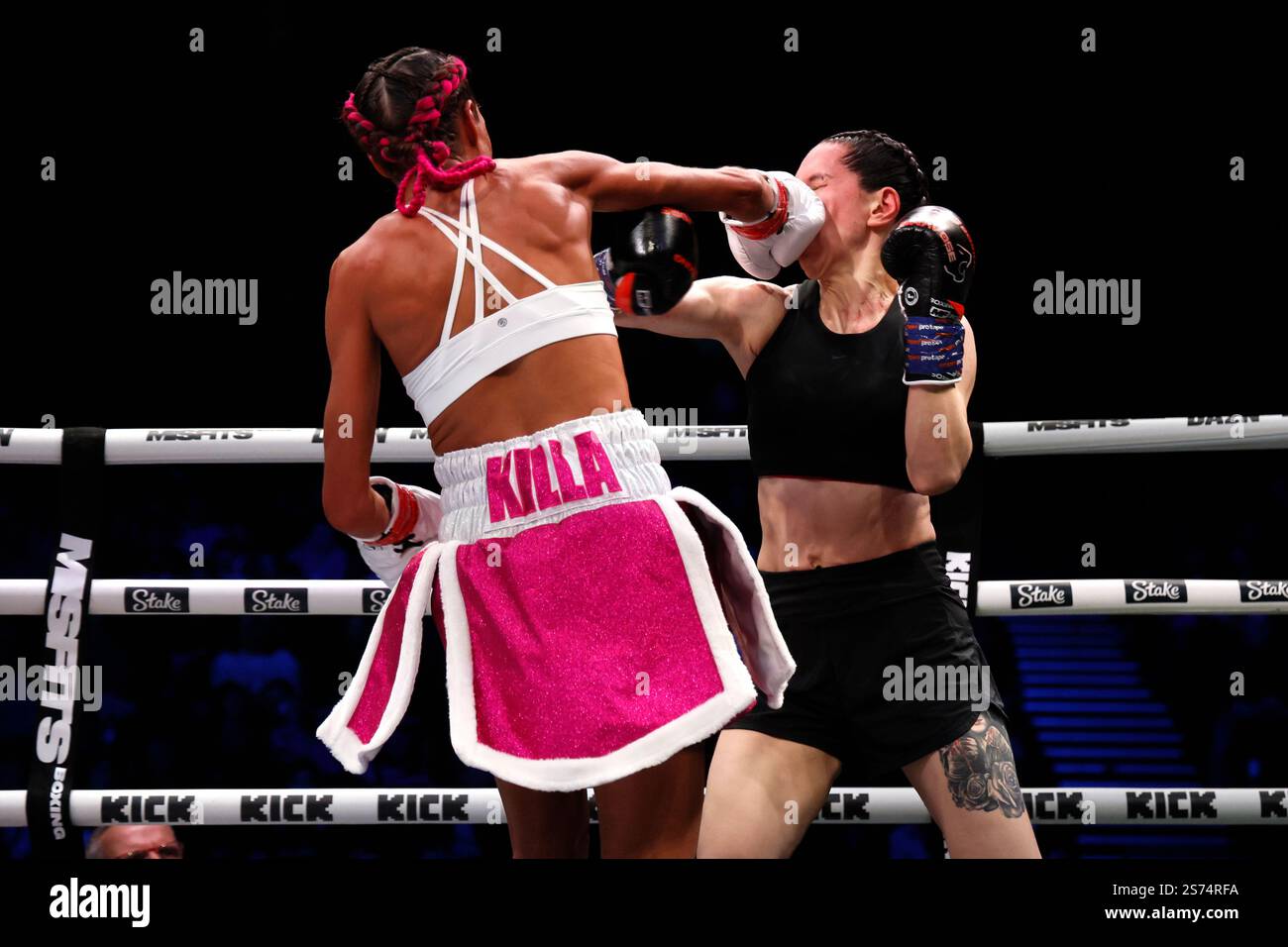 Carla Jade (left) strikes Melanie Shah in the Misfit Light Title bout ...