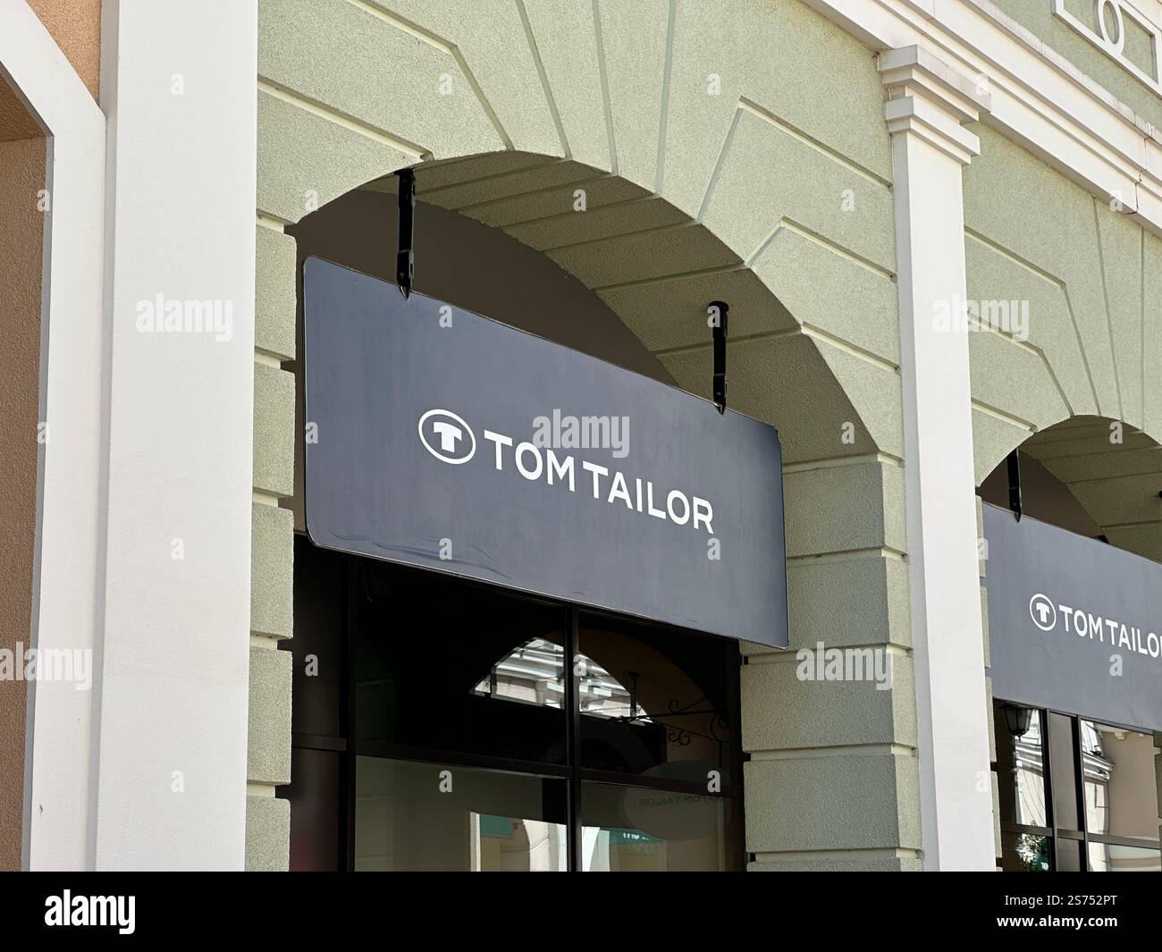 Belgrade, Serbia - June 16, 2024: Tom Tailor store exterior with branding sign in shopping area ...