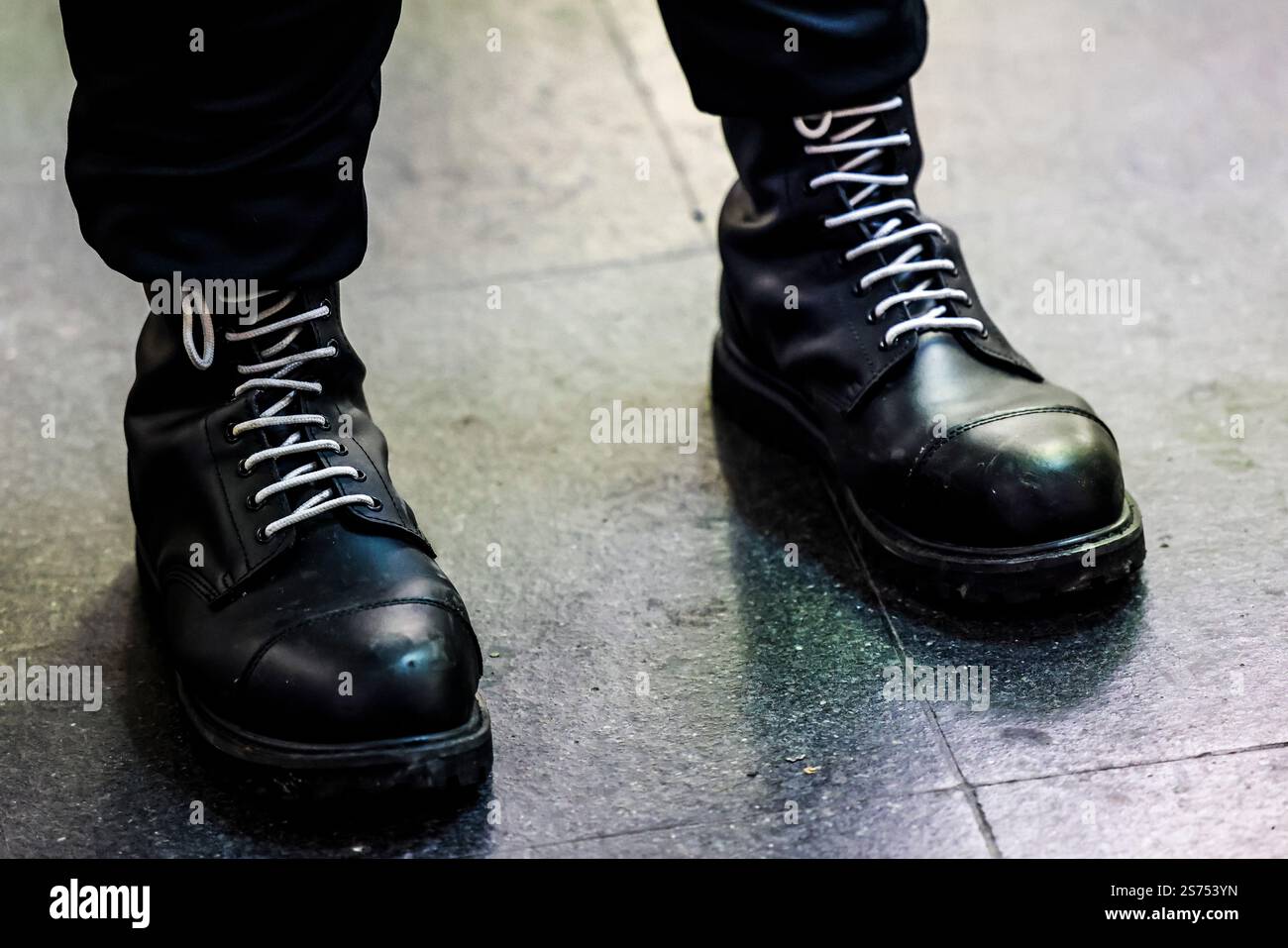 Aachen, Germany. 18th Jan, 2025. A participant in a right-wing ...