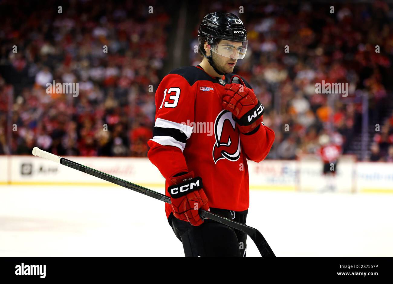 New Jersey Devils center Nico Hischier (13) looks on during the second ...