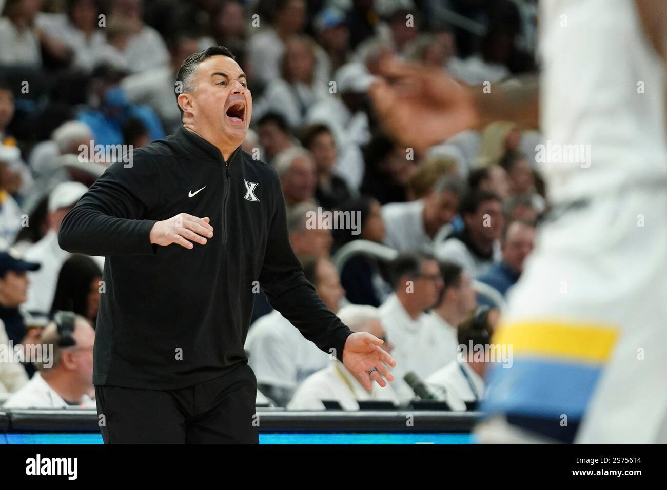 Xavier head coach Sean Miller shouts during the second half of an NCAA ...