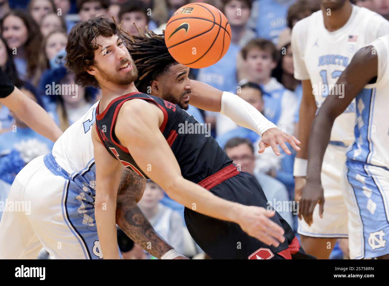 Stanford guard Benny Gealer, left, and North Carolina guard RJ Davis ...
