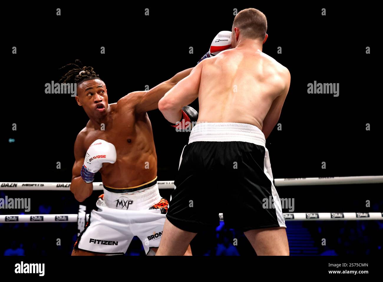 Moziah Pinder (left) in action against Wade Plemons in the light ...