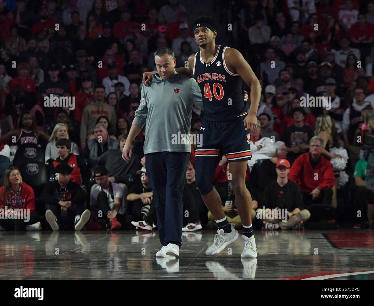 ATHENS, GA - JANUARY 18: An injured Auburn Tigers center Dylan Cardwell ...