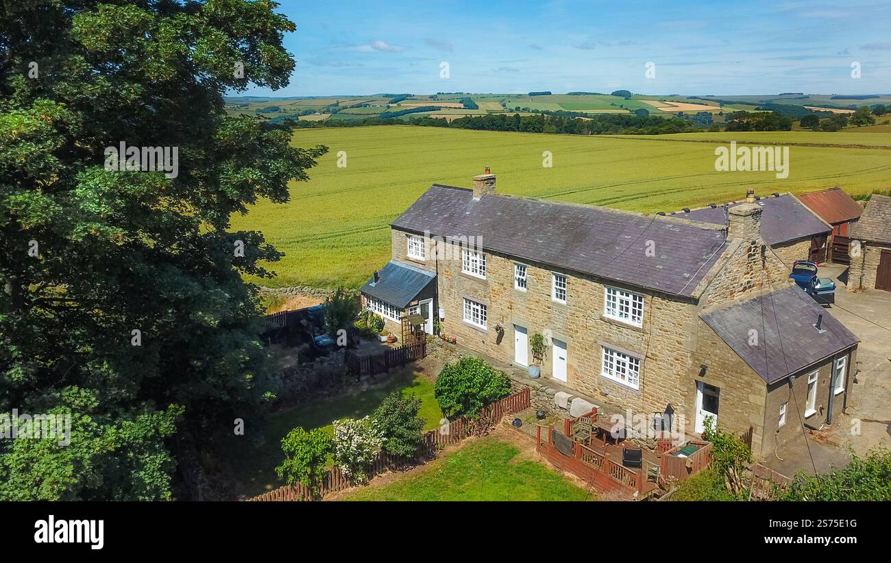 Aerial drone view of british rural farm house farmstead with stone ...