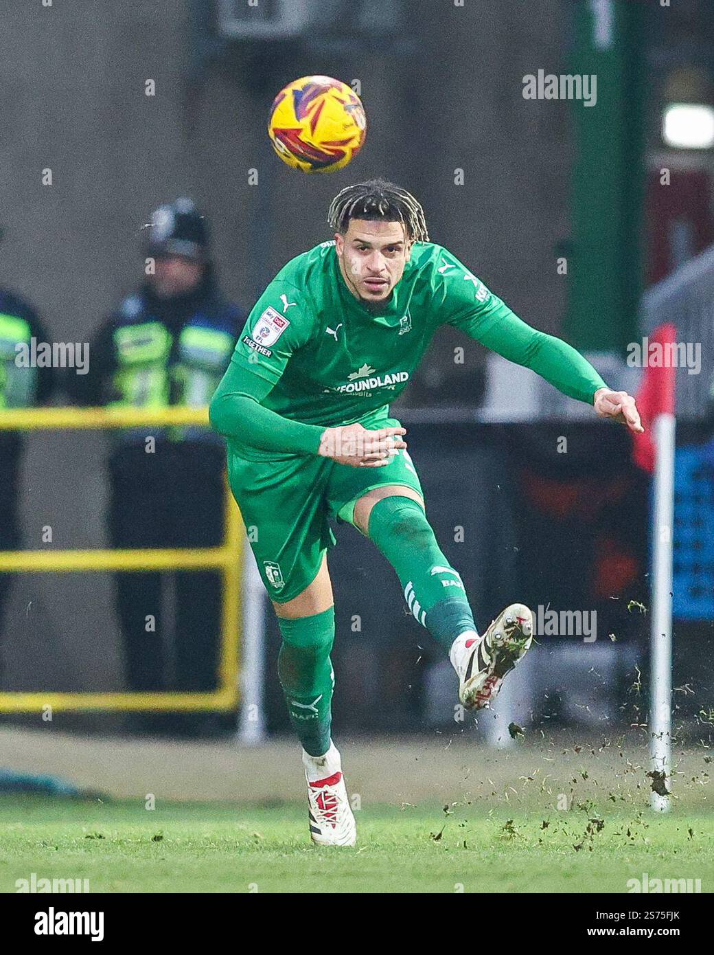 Swindon, UK. 18th Jan 2025. #42, Theo Vassell of Barrow AFC clears the ...