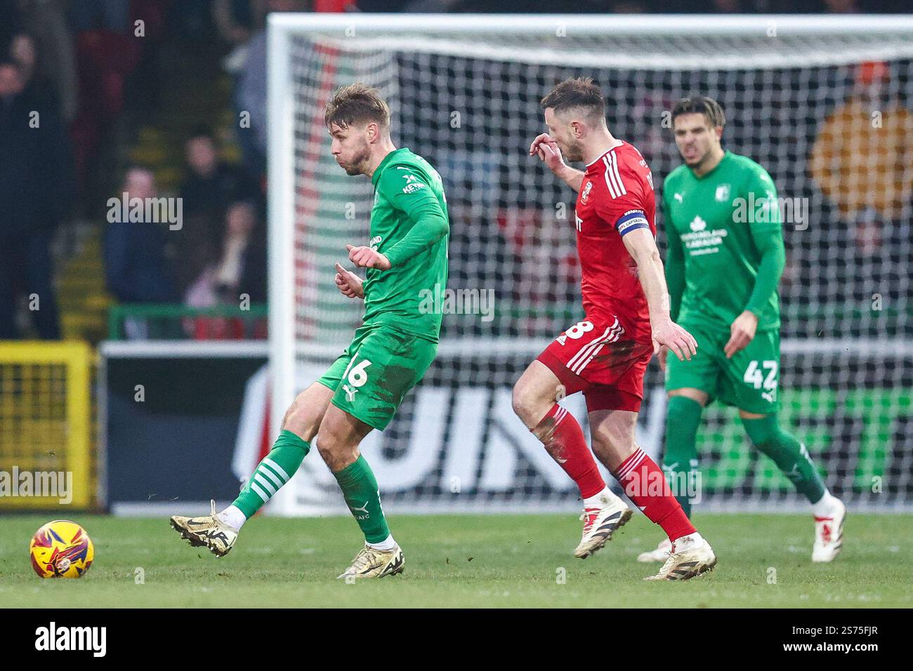 Swindon, UK. 18th Jan 2025. #16, Sam Foley of Barrow AFC in action with ...