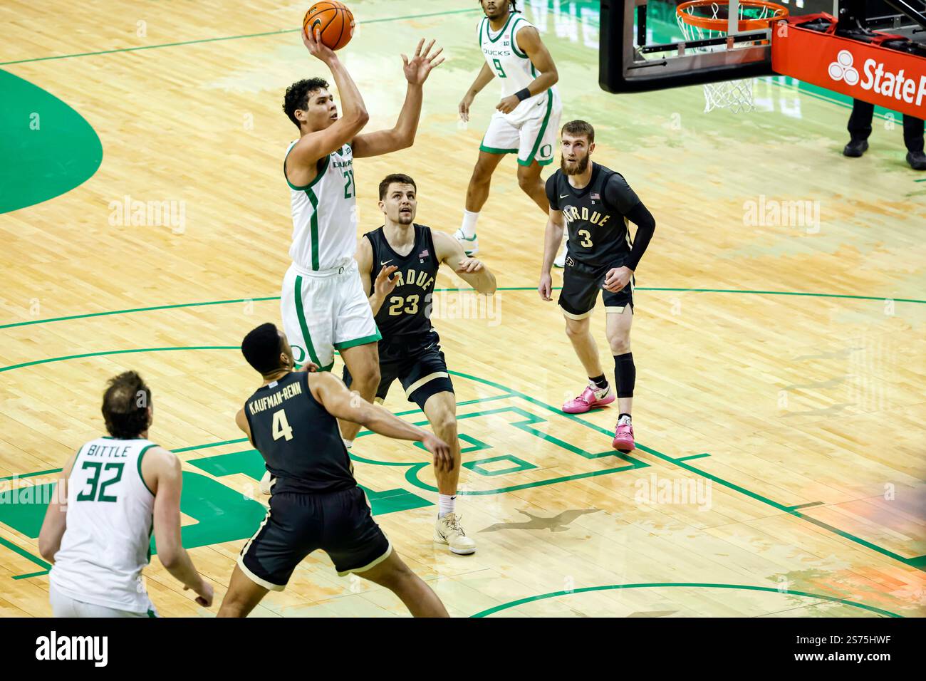 Oregon forward Brandon Angel (21) shoots over Purdue defenders during ...