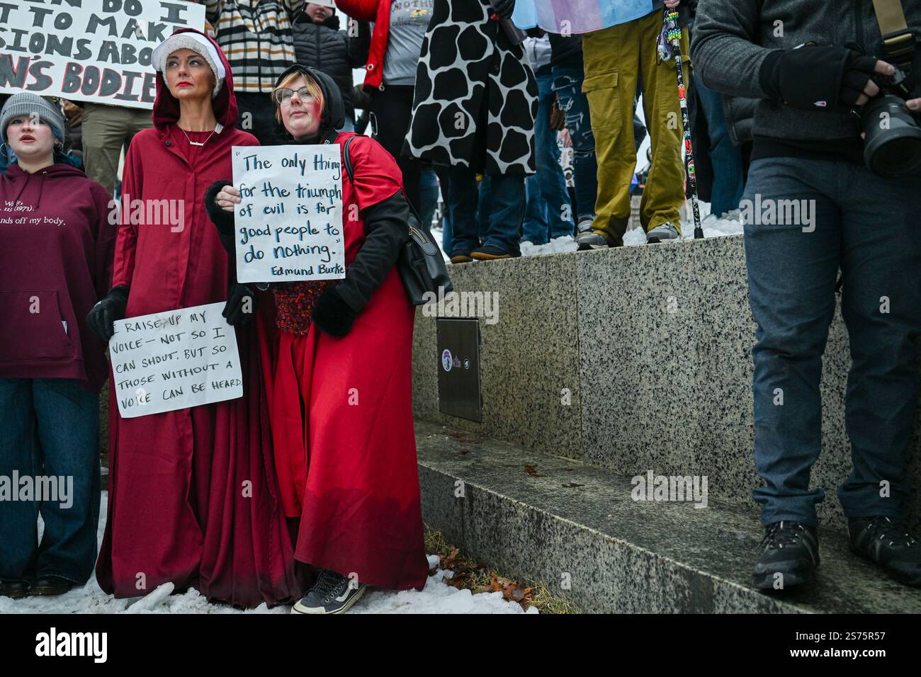 Washington, USA. 18th Jan, 2025. Demonstrators wearing “Handmaids Tale ...