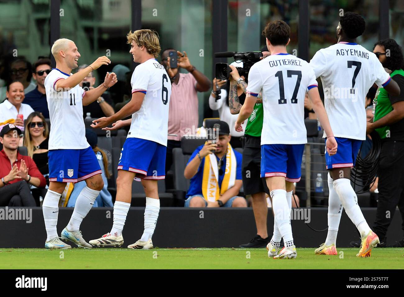 United States forward Matko Miljevic (11) celebrates with teammates ...