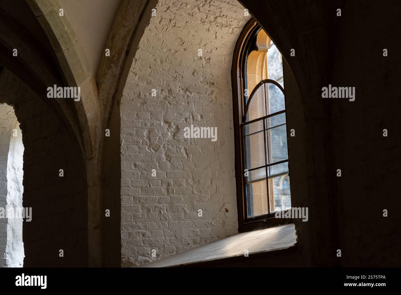 Vaulted castle window structure with deep wall and sunlight Stock Photo ...