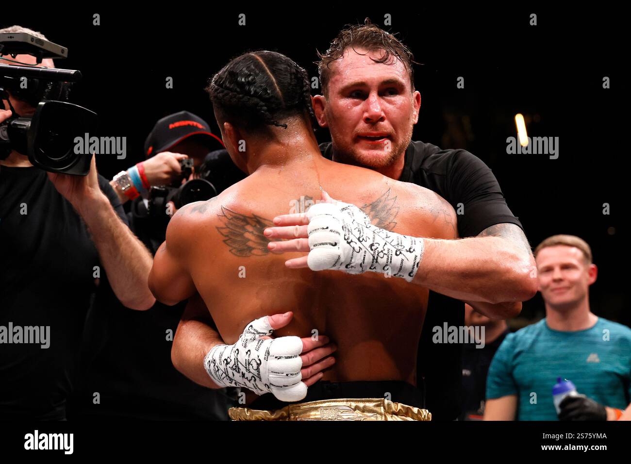 Darren Till (right) hugs Anthony Taylor after winning the heavyweight ...