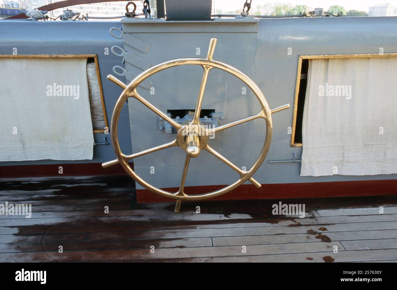 The wheel on the bridge of the battleship Aurora (Russian: Авро́ра) in ...