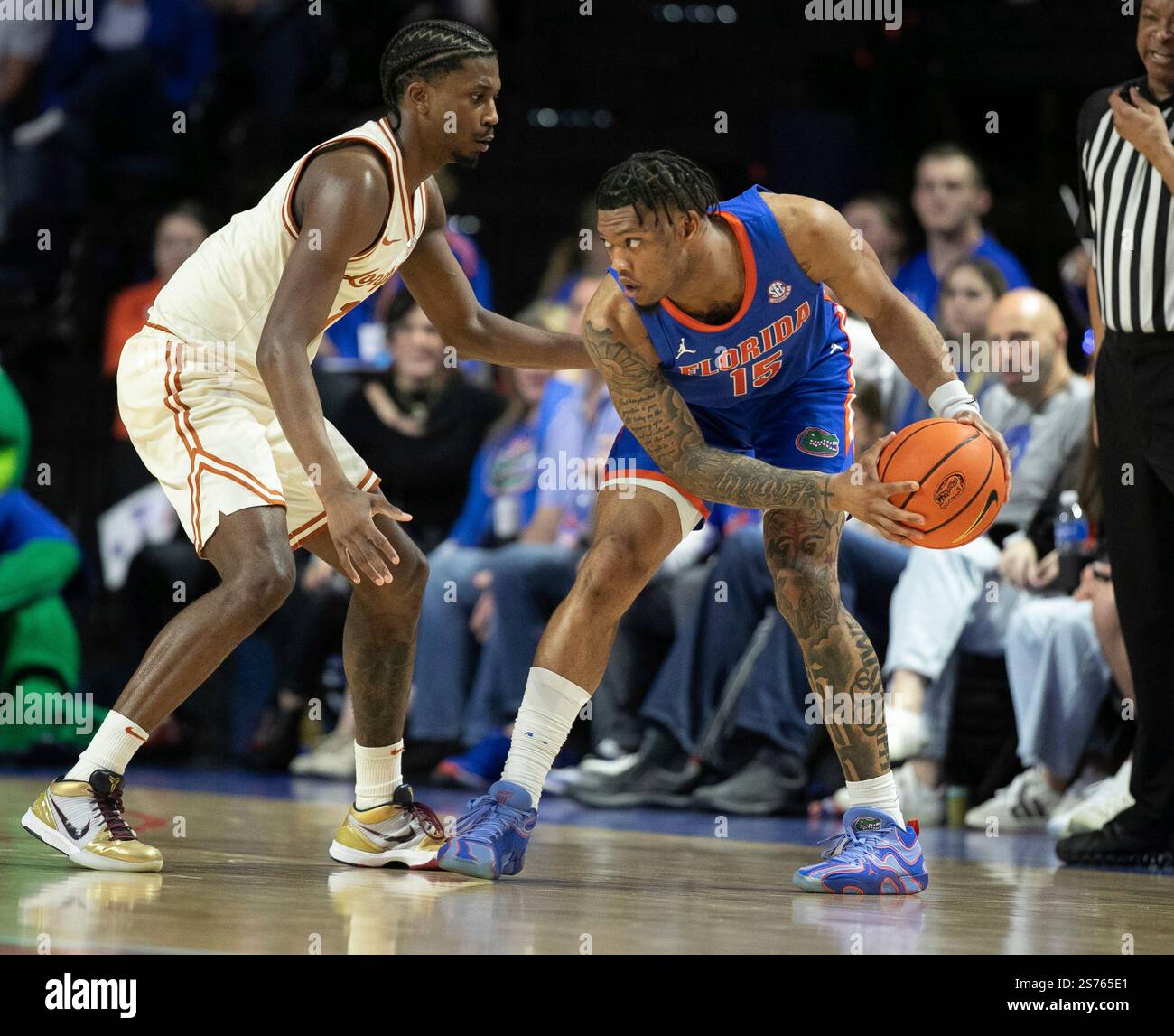 Texas forward Cole Bott, left, pressures Florida guard Alijah Martin ...