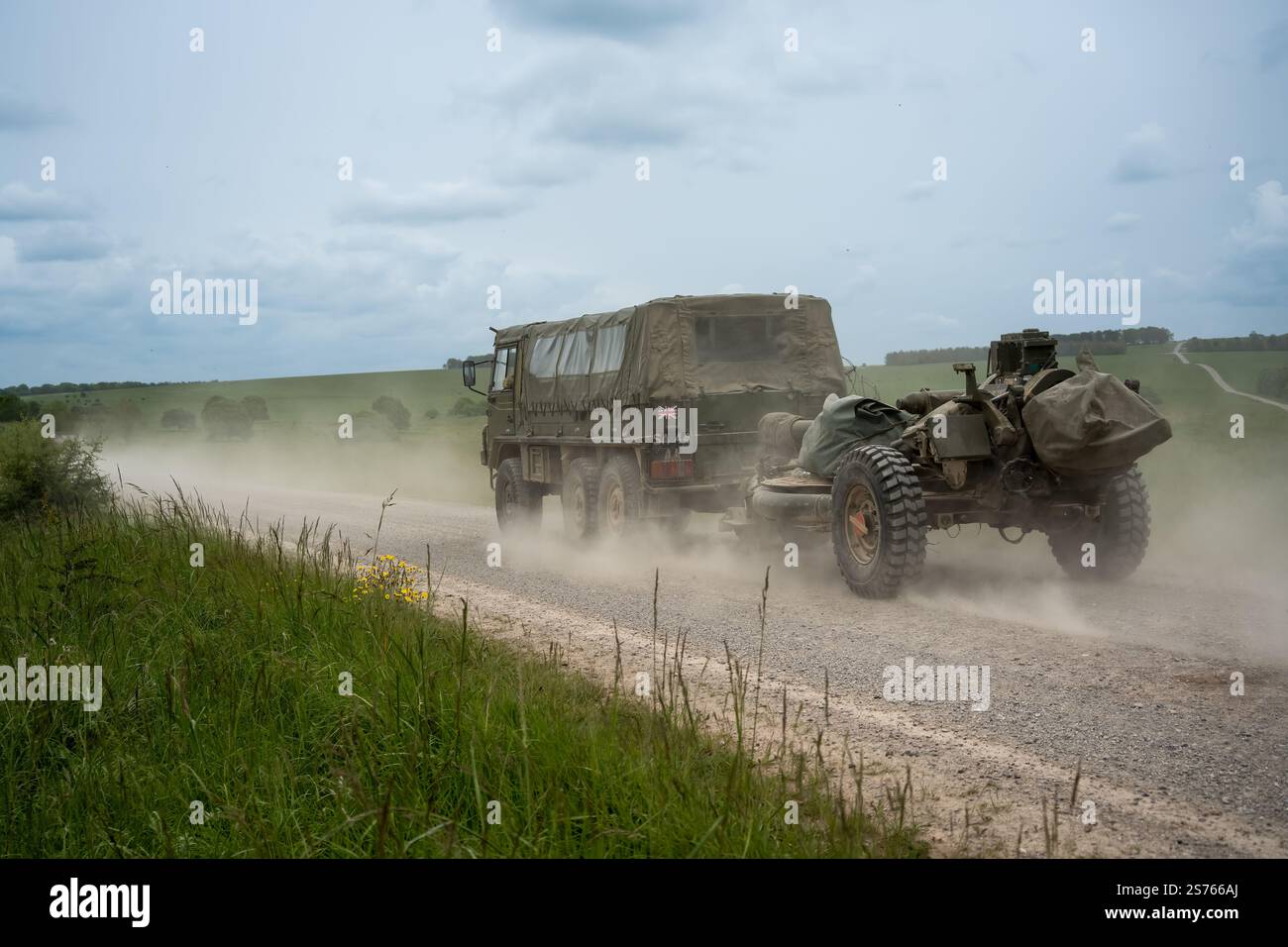 Pinzgauer 6x6 utility vehicle towing a 105mm Light Artillery Gun on a ...