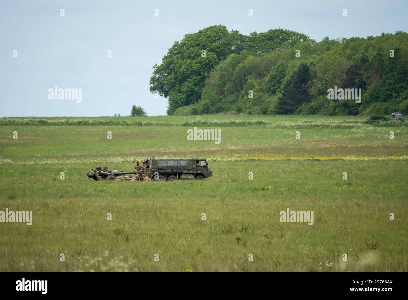 Pinzgauer 6x6 utility vehicle towing a 105mm Light Artillery Gun on a ...