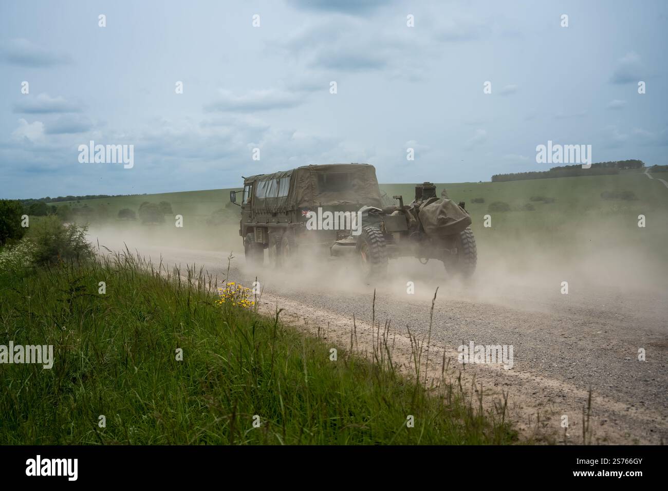 Pinzgauer 6x6 utility vehicle towing a 105mm Light Artillery Gun on a ...