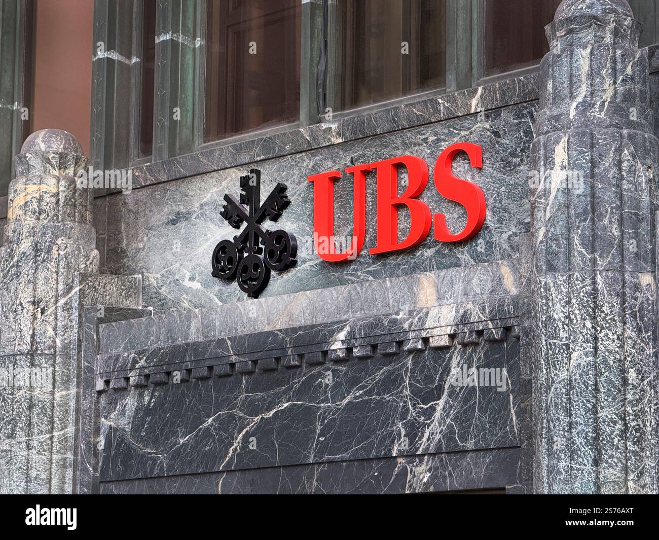 UBS Group AB, office building exterior with company logo and sign above ...