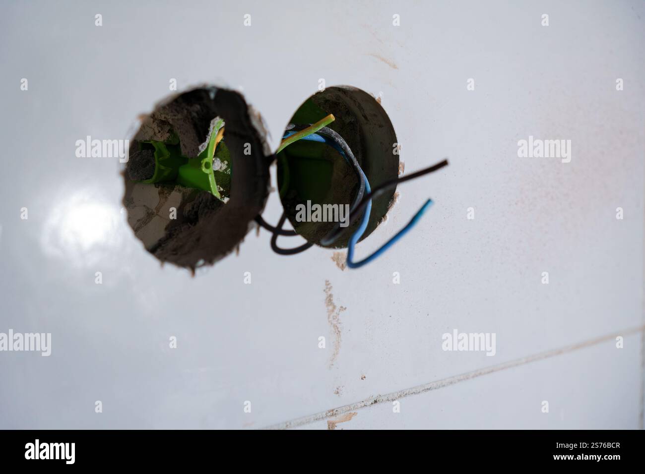 Close-Up View of Electrical Wiring and Wall Holes in a Renovation ...