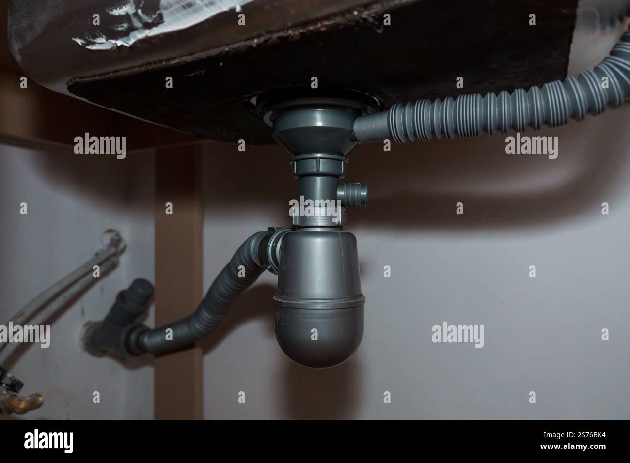 Detailed View of a Kitchen Sink's Plumbing Drainage System Stock Photo ...