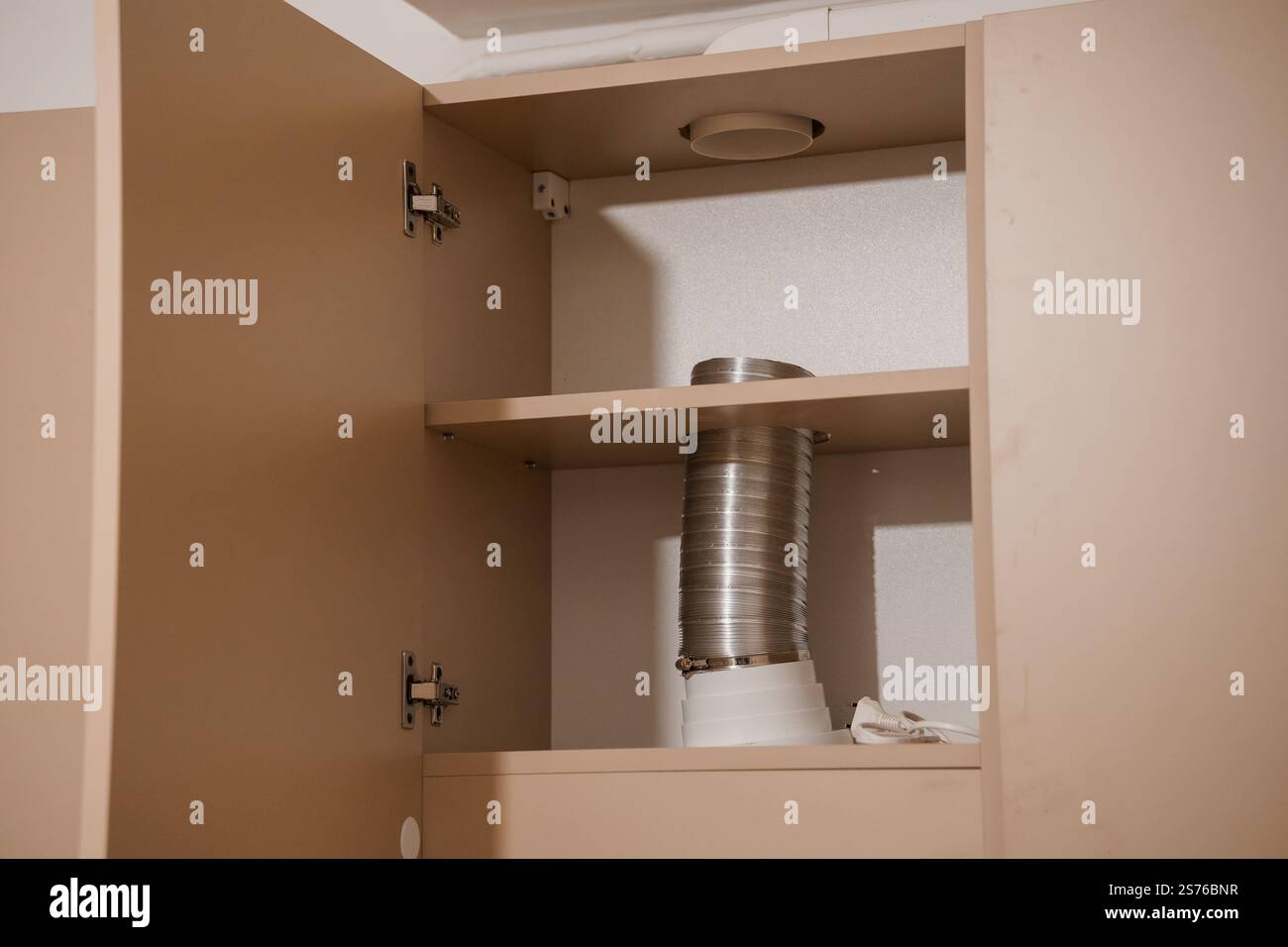 Interior View of a Kitchen Cabinet Featuring a Ventilation Duct Stock ...