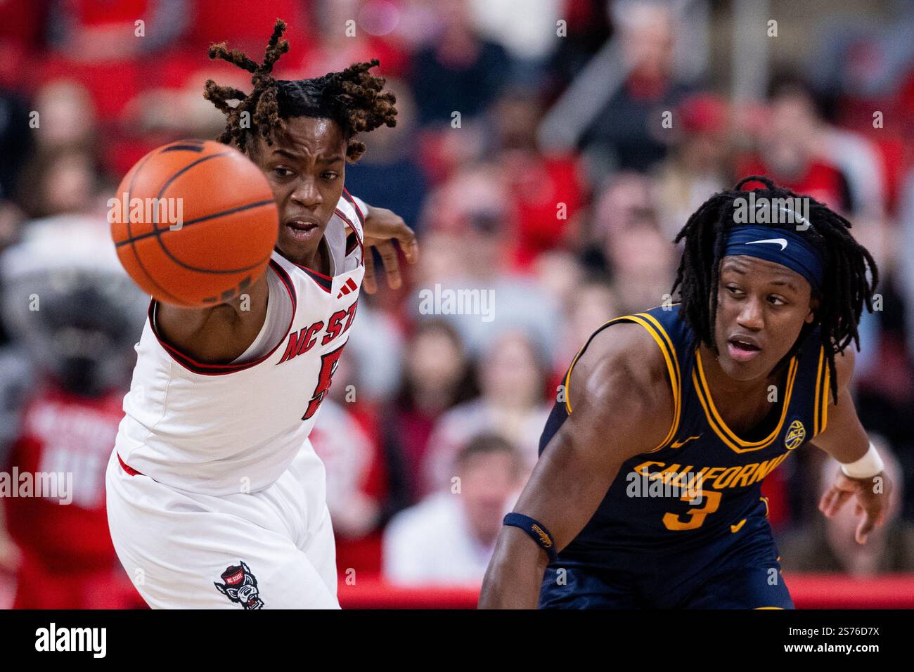 January 18, 2025: North Carolina State guard Trey Parker (5) knocks the ...