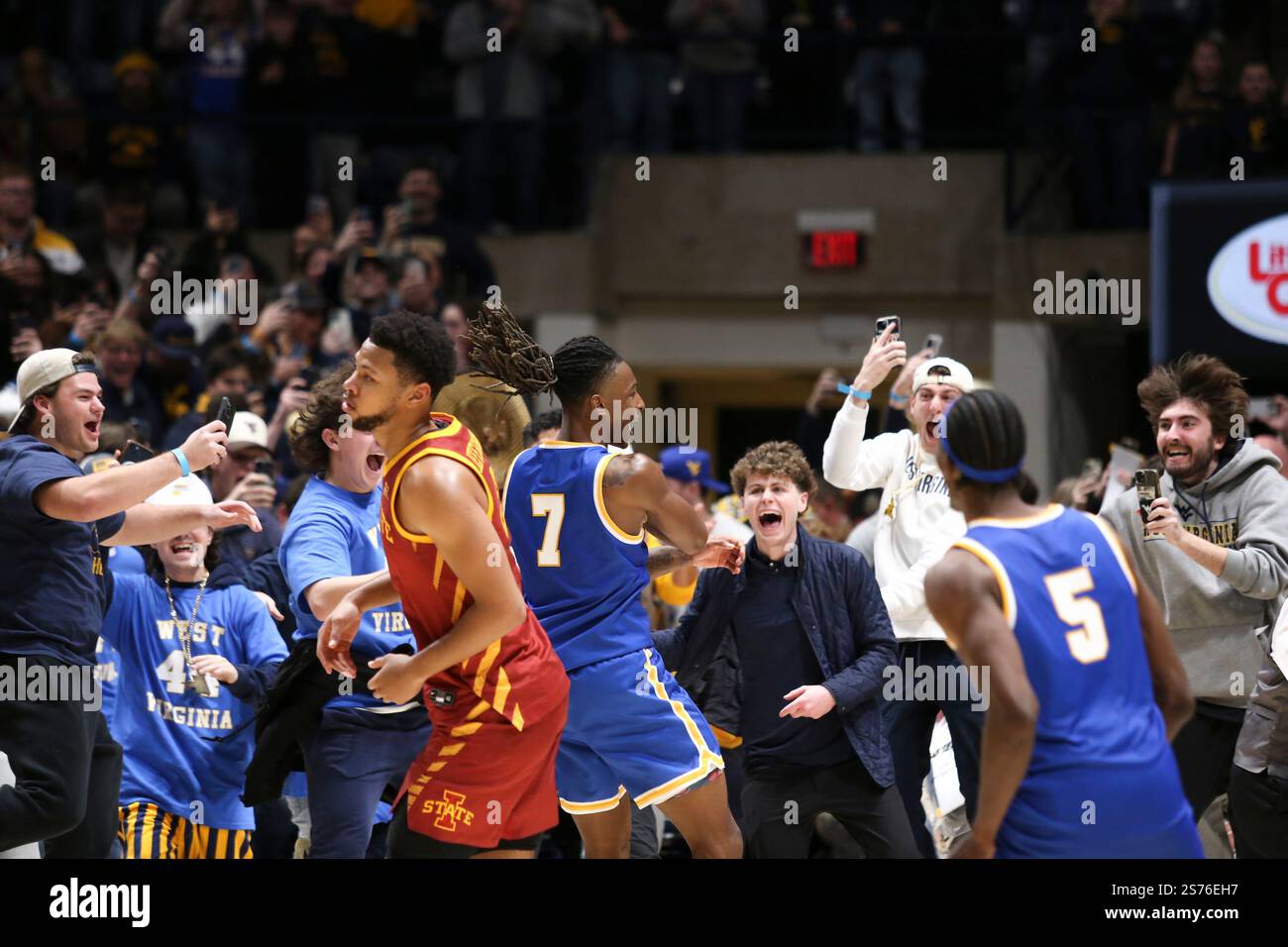 West Virginia guard Javon Small (7) celebrates with the students after ...
