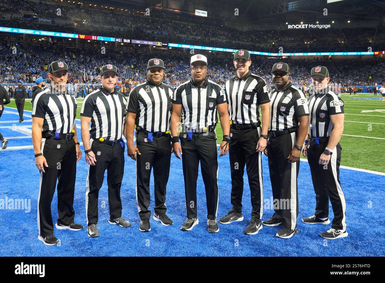 Officials including line judge Tim Podraza, umpire Duane Heydt; side ...