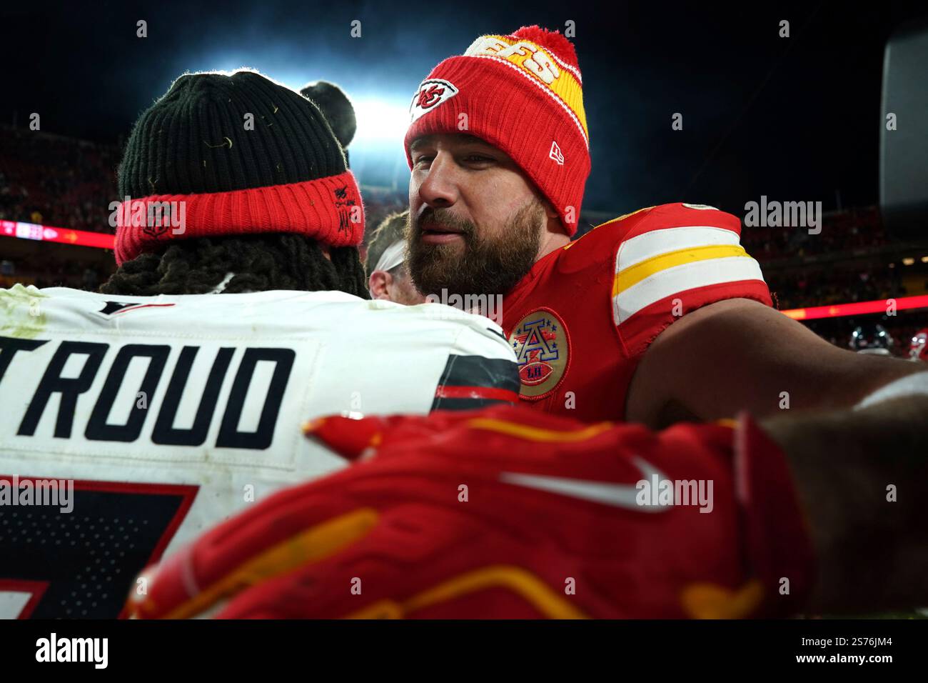 Kansas City Chiefs tight end Travis Kelce, right, hugs Houston Texans ...