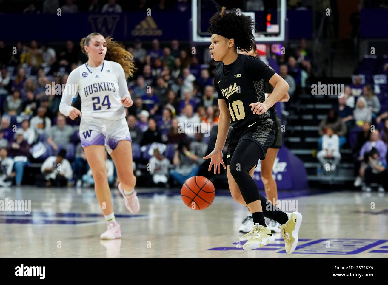 Purdue guard Jordyn Poole moves the ball against Washington guard Elle ...