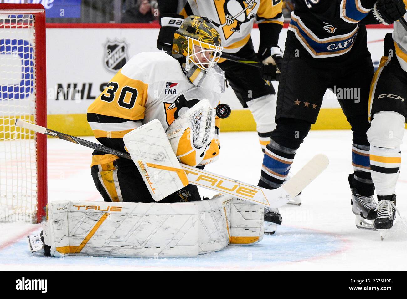 Pittsburgh Penguins goaltender Joel Blomqvist (30) stops the puck ...