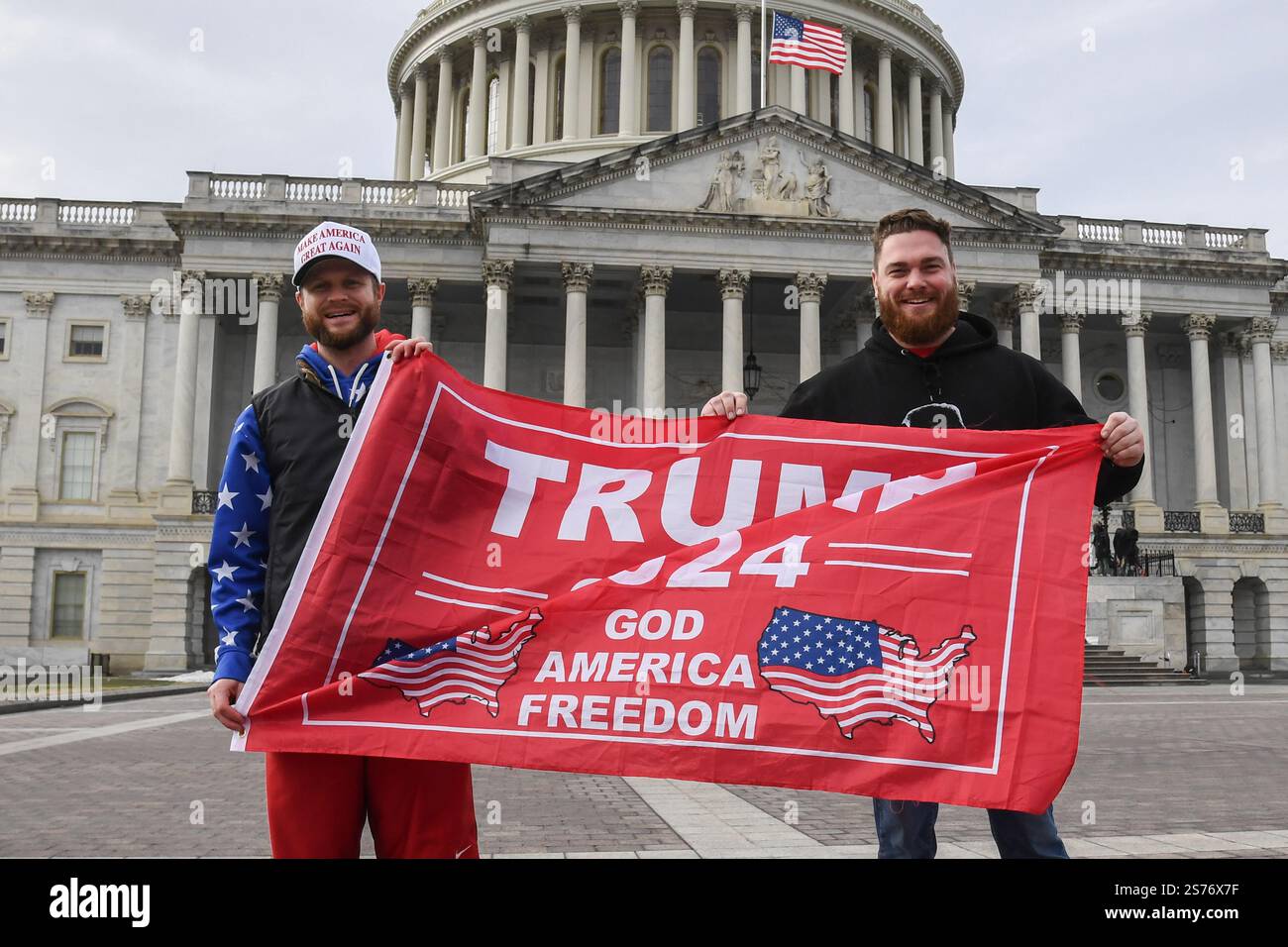 People wearing merchandise in support of President-elect Donald Trump ...
