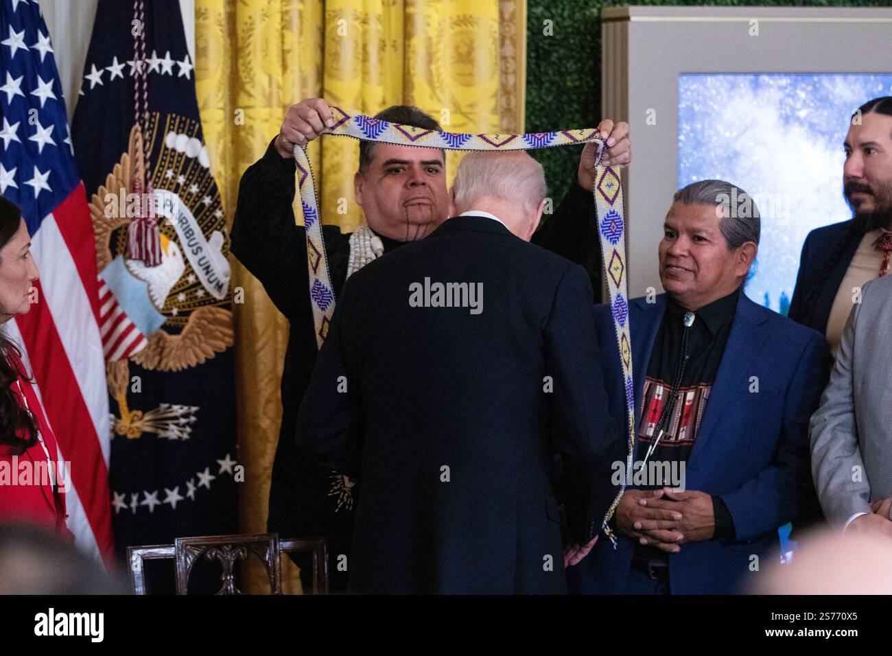 United States President Joe Biden is gifted an indigenous sash ...