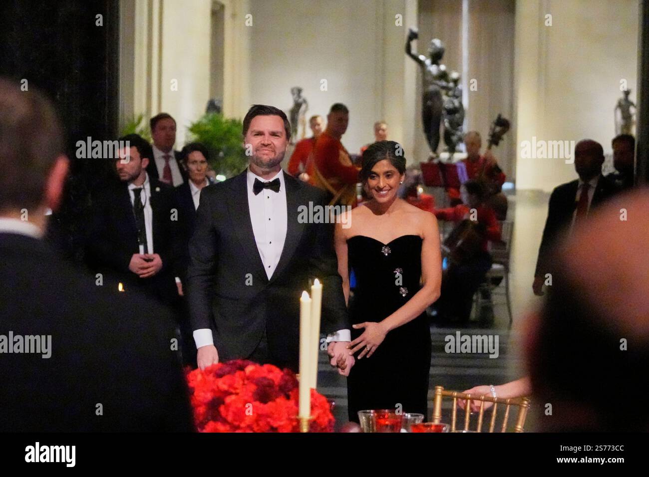 Vice President-elect JD Vance, left, and his wife, Usha Vance, arrive ...