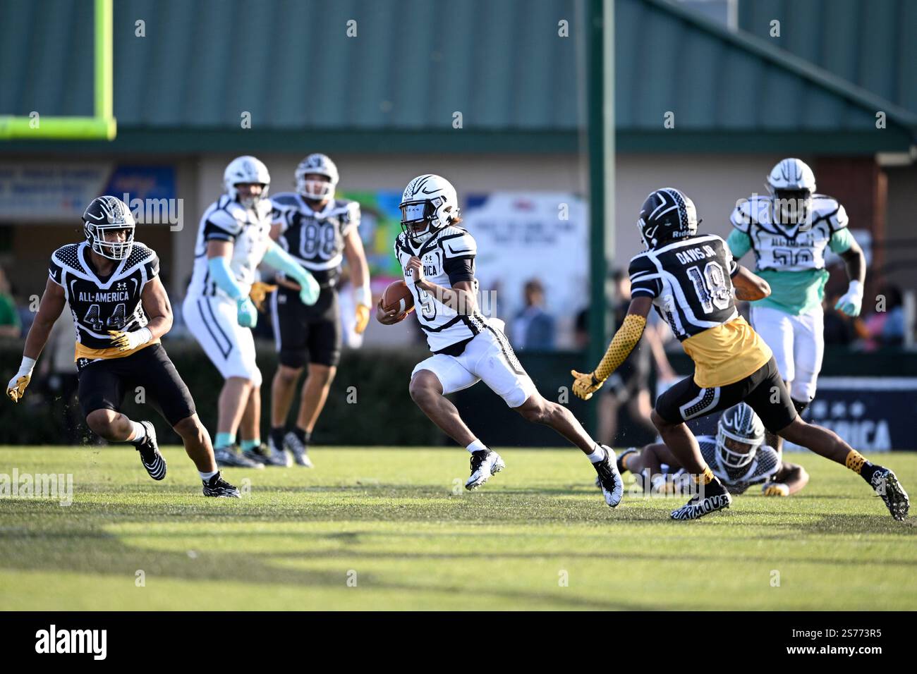 Team Unstoppable quarterback KJ Lacey (9) scrambles for yardage in ...