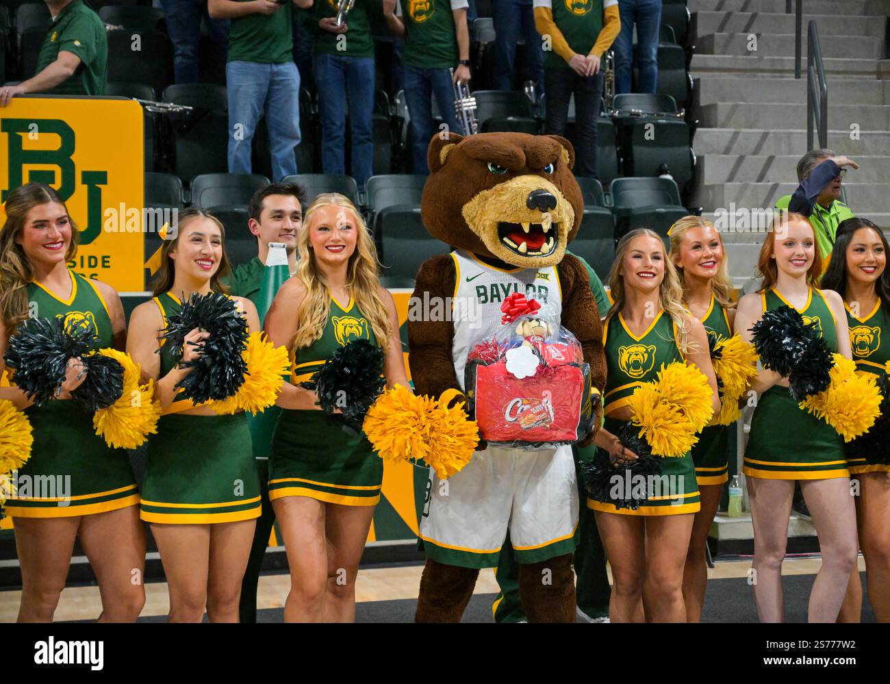 January 2025: Baylor Lady Bears cheerleaders and mascot giving away a ...