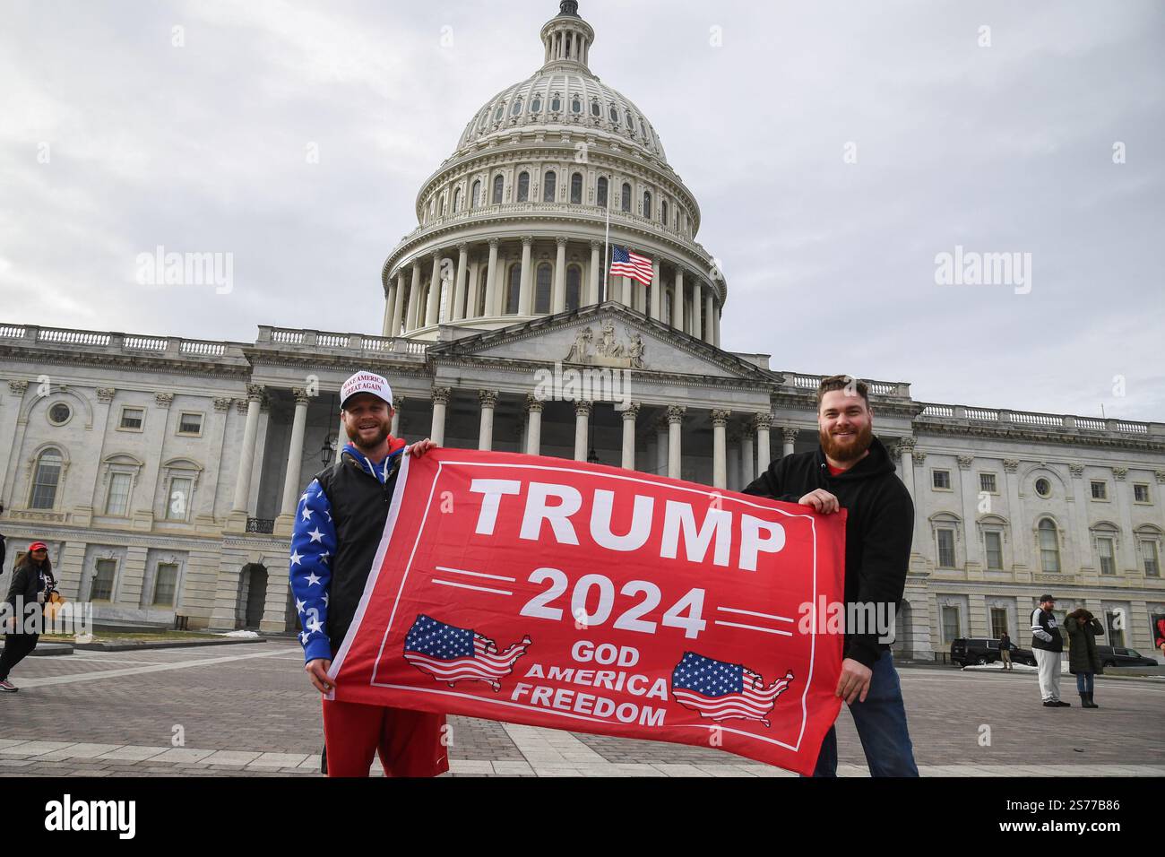 People wearing merchandise in support of President-elect Donald Trump ...