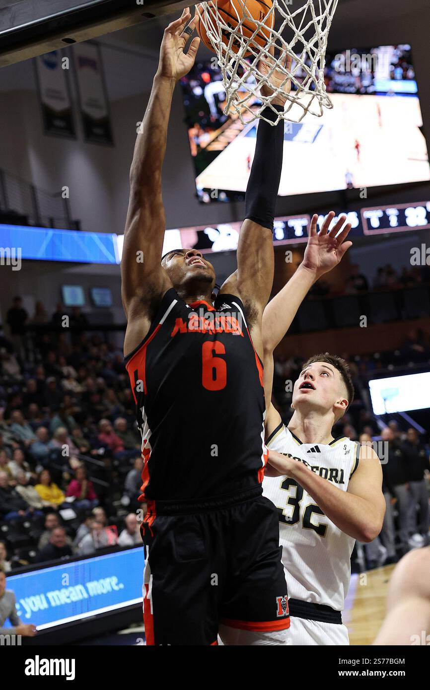 SPARTANBURG, SC - JANUARY 18: Mercer Bears forward Alex Holt (6) dunks ...