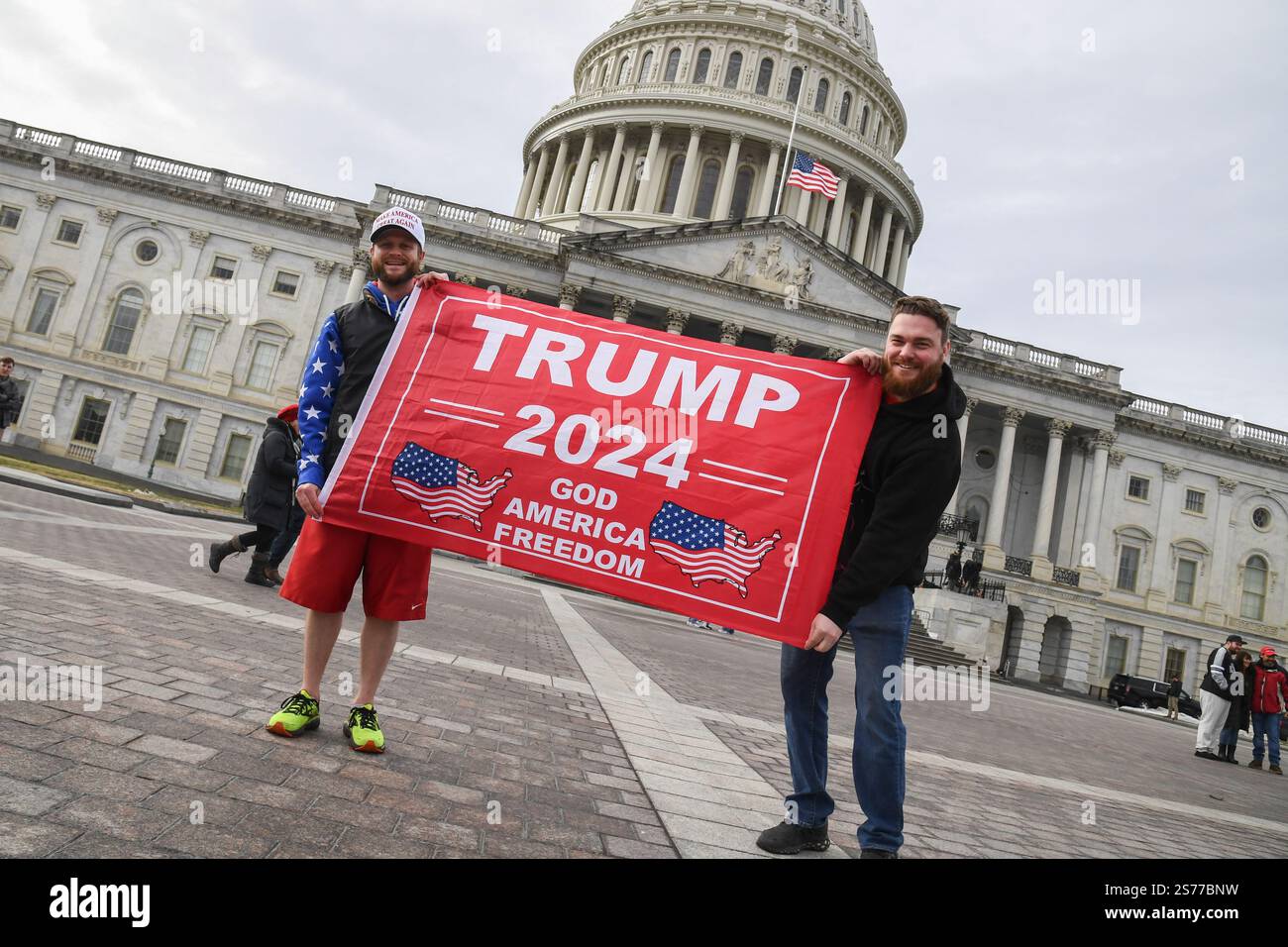 People wearing merchandise in support of President-elect Donald Trump ...
