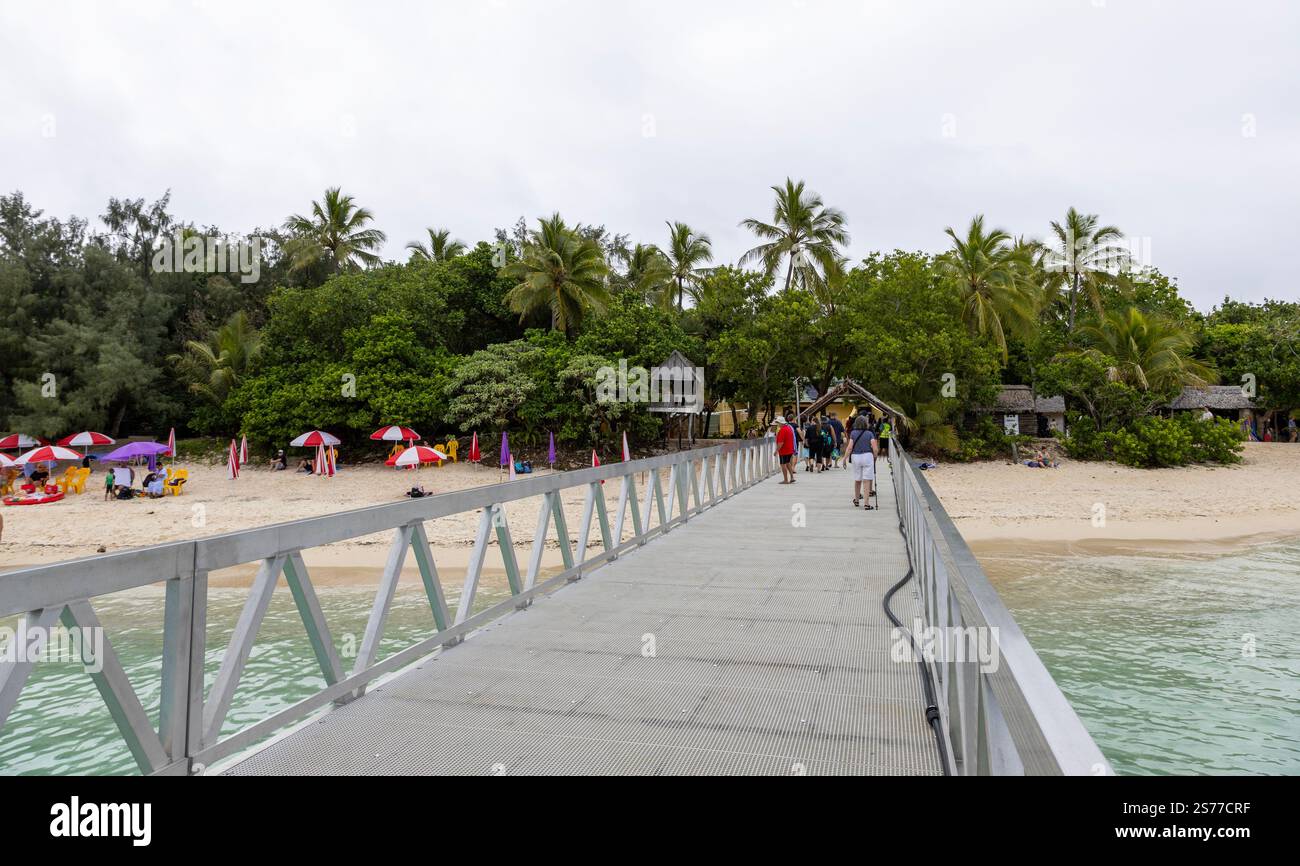 Tourists from a cruise ship using the Mystery Island metallic pier ...