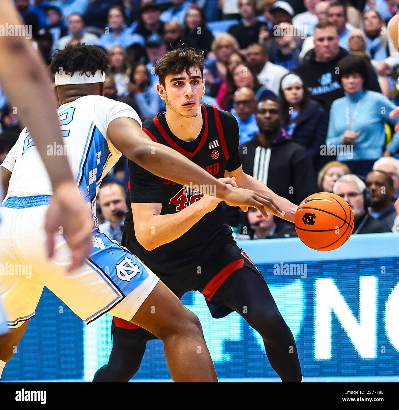January 18, 2025: Stanford senior Maxime Raynaud (42) drives to basket ...